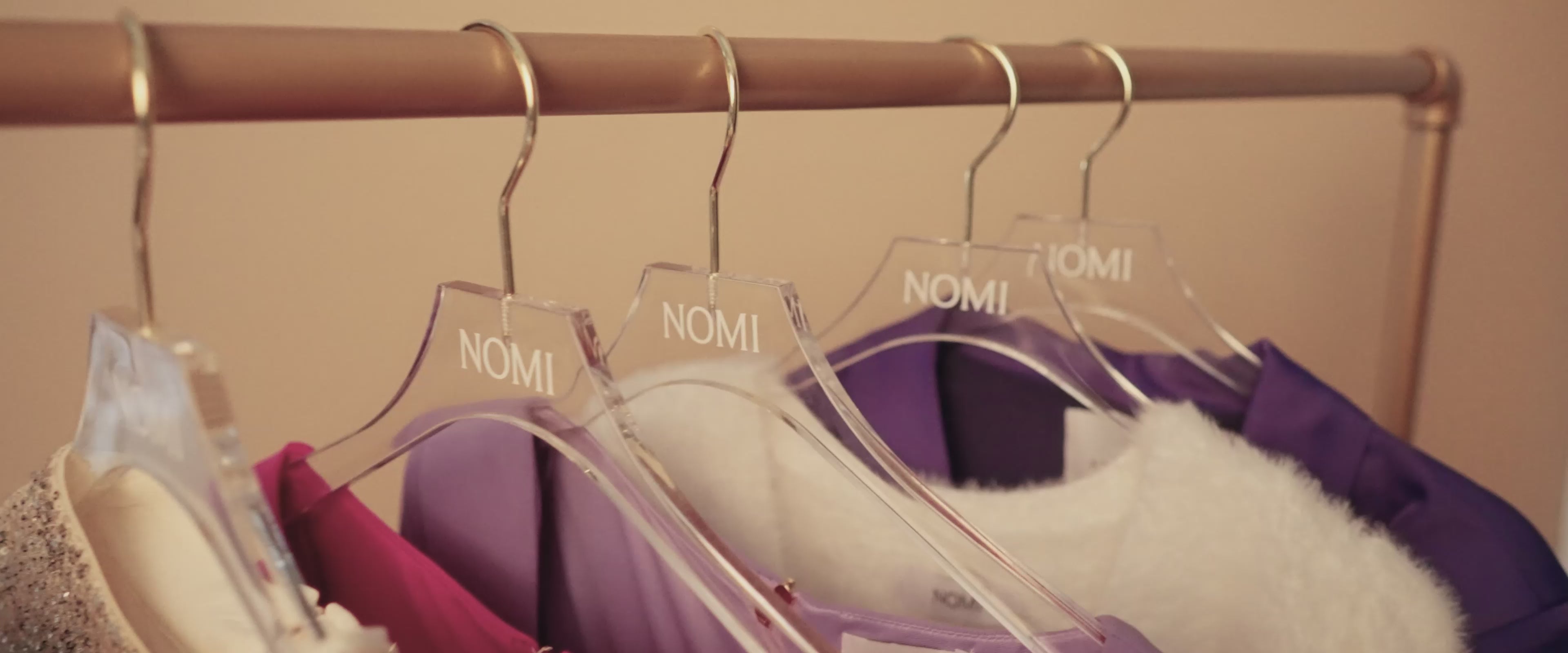 Nomi